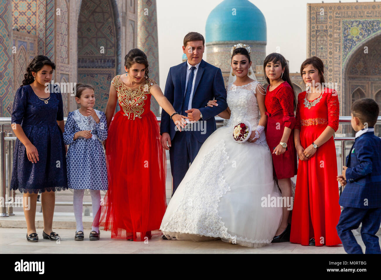 A ‘Just Married’ Young Couple Pose For Wedding Photos At The Registan ...