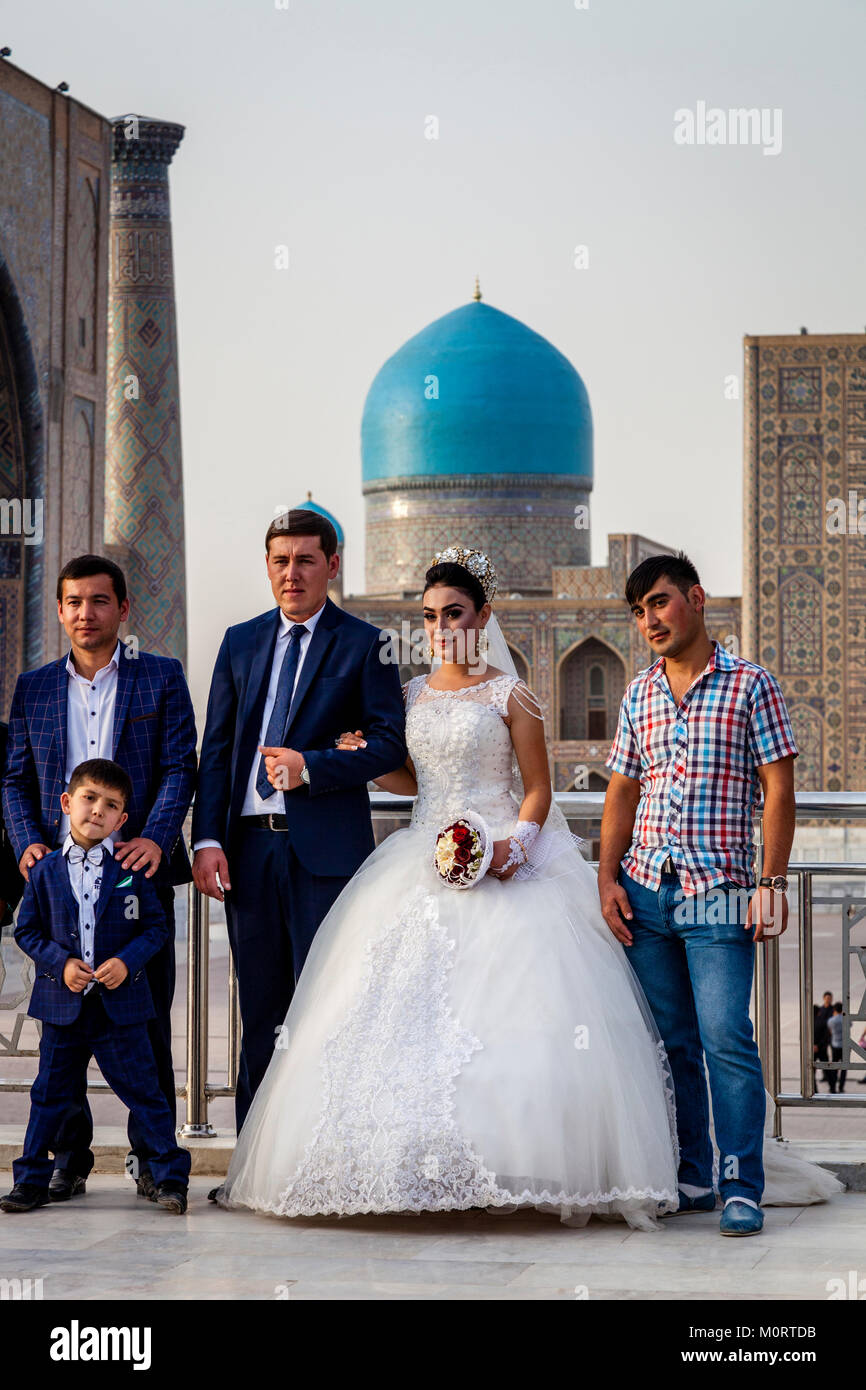 A ‘Just Married’ Young Couple Pose For Wedding Photos At The Registan ...