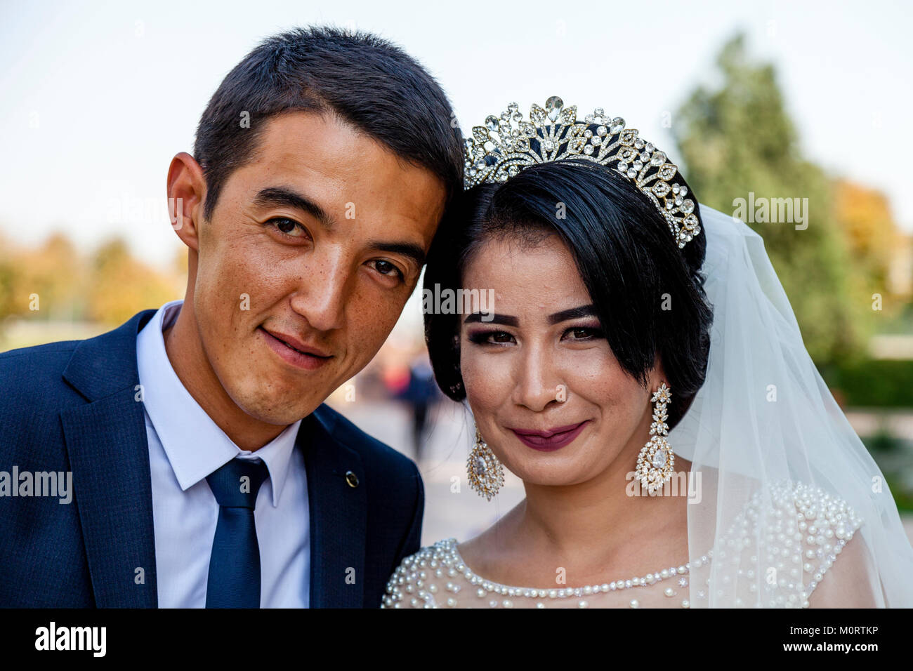 A ‘Just Married’ Young Couple Pose For Wedding Photos At The Registan ...