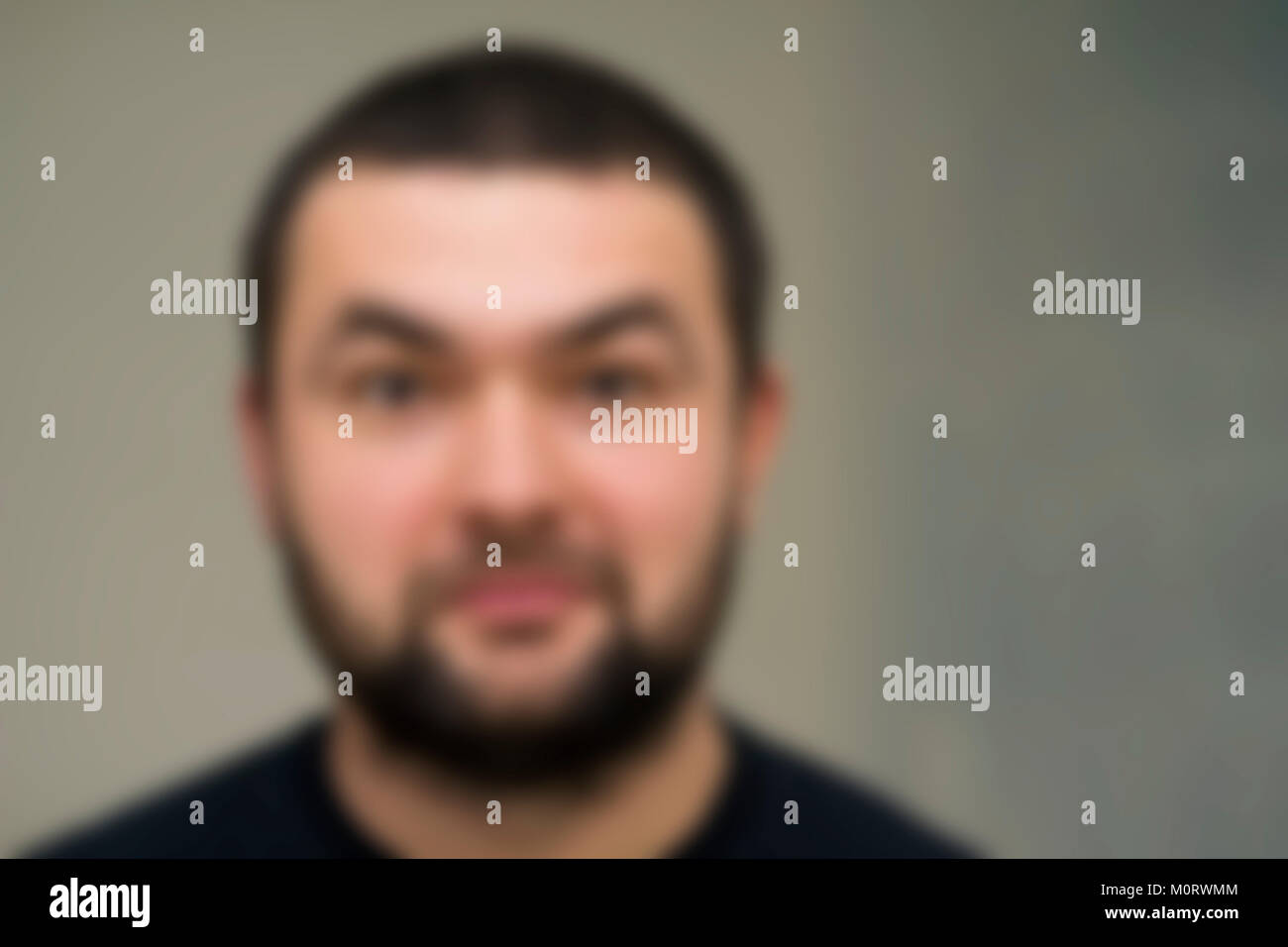 Portrait of a blurred handsome young bearded man. Blurr effect Stock ...