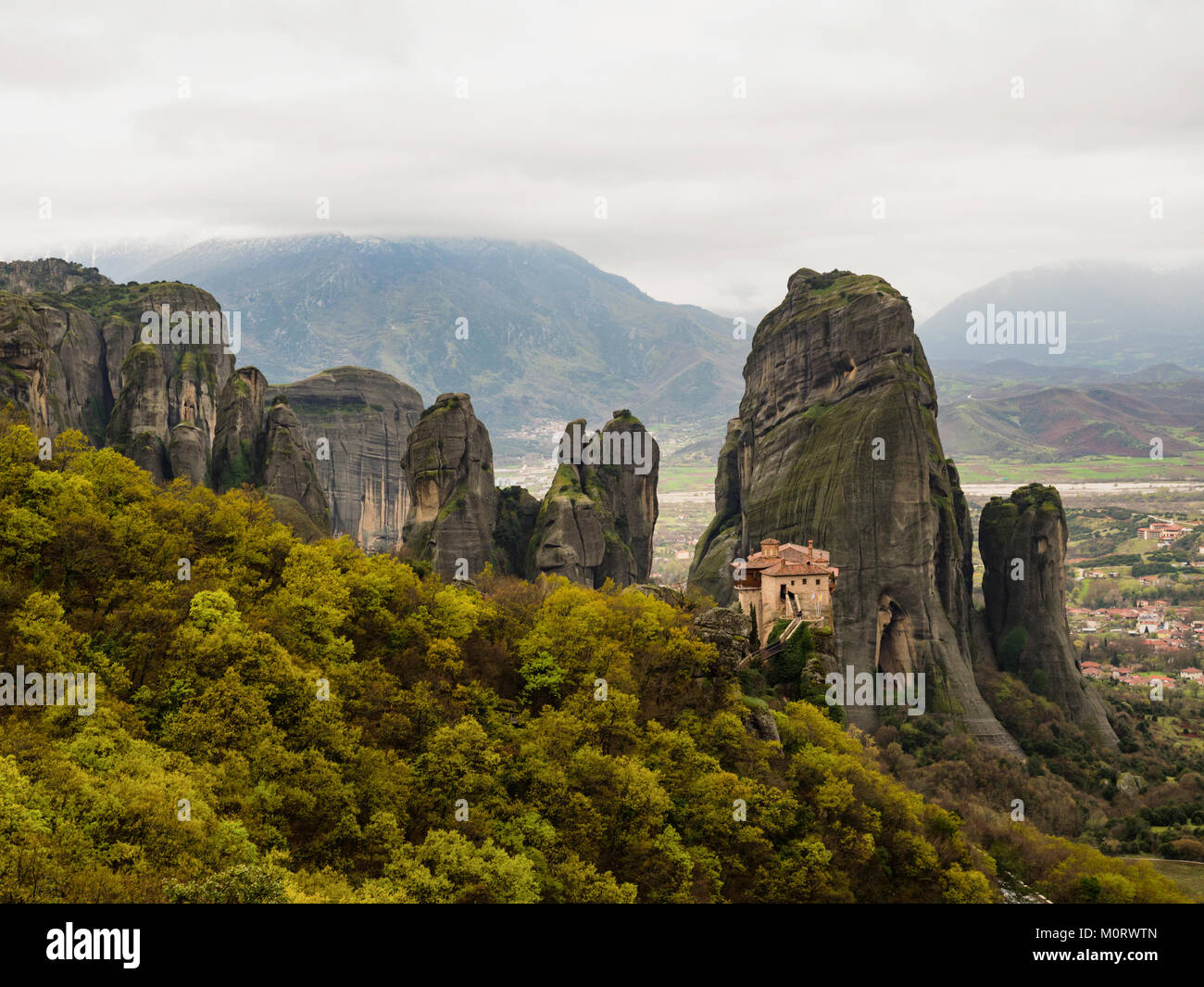 Landscape of Meteora with a monastery on top of the mountain in north ...