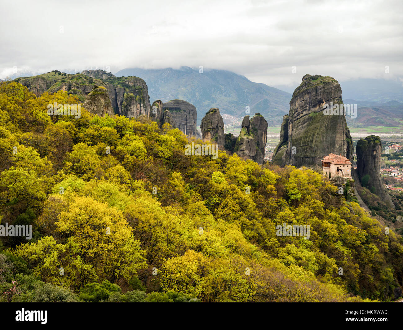 Landscape of Meteora with a monastery on top of the mountain in north ...