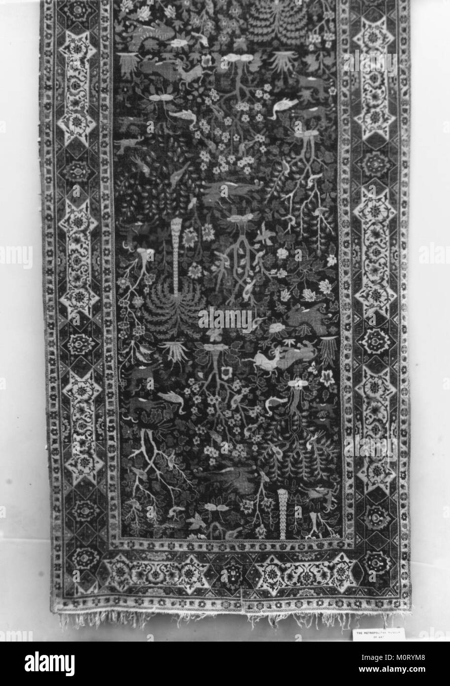 This 17th-century carpet, featuring intricate depictions of palm trees ...