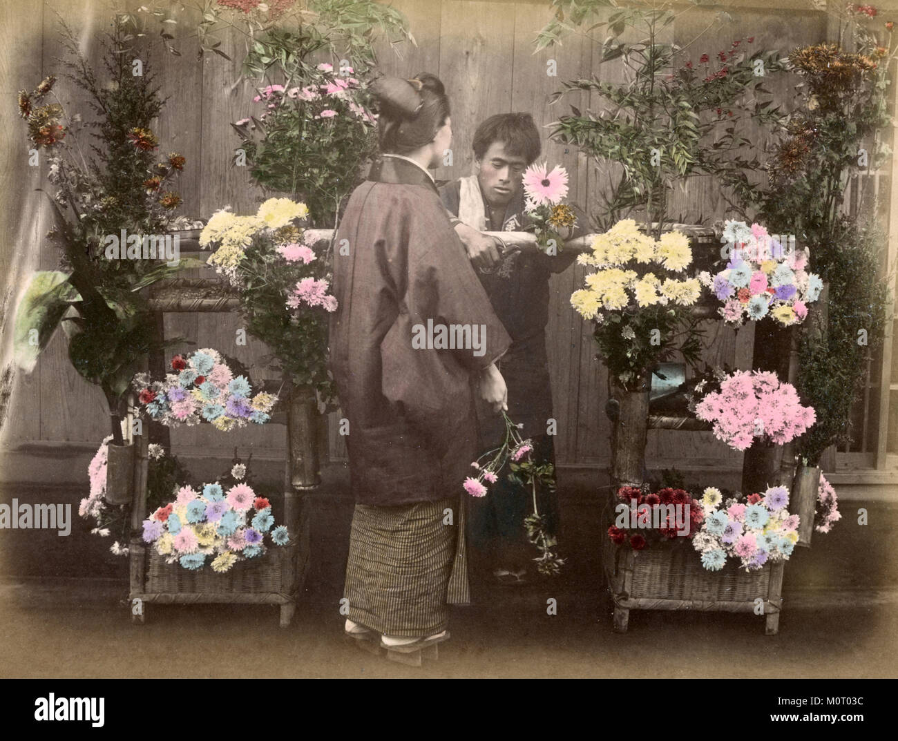 c. 1880s Japan - flower seller vendor Stock Photo - Alamy