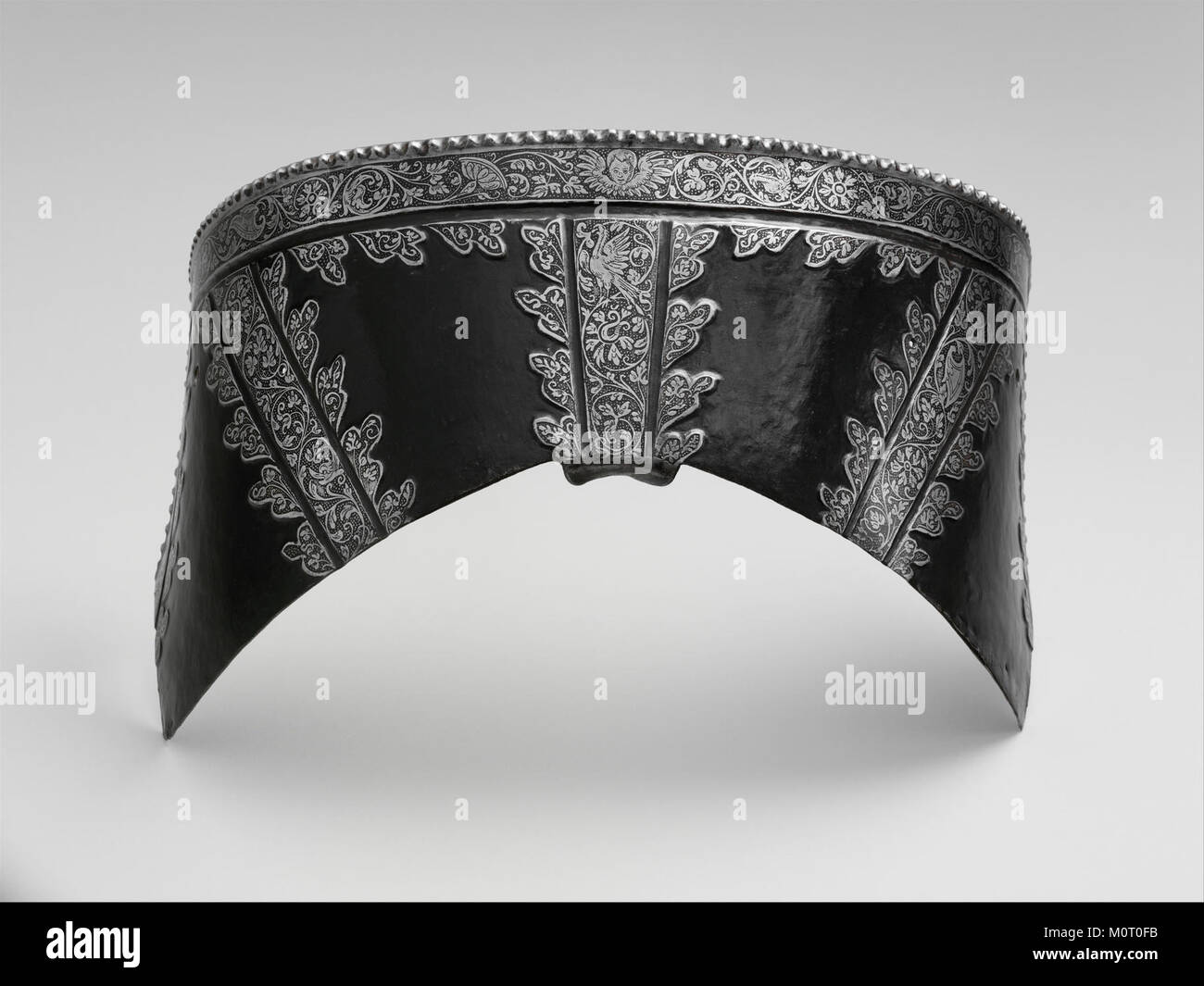 This cantle plate is an ornamental piece from a horse's saddle, part of ...