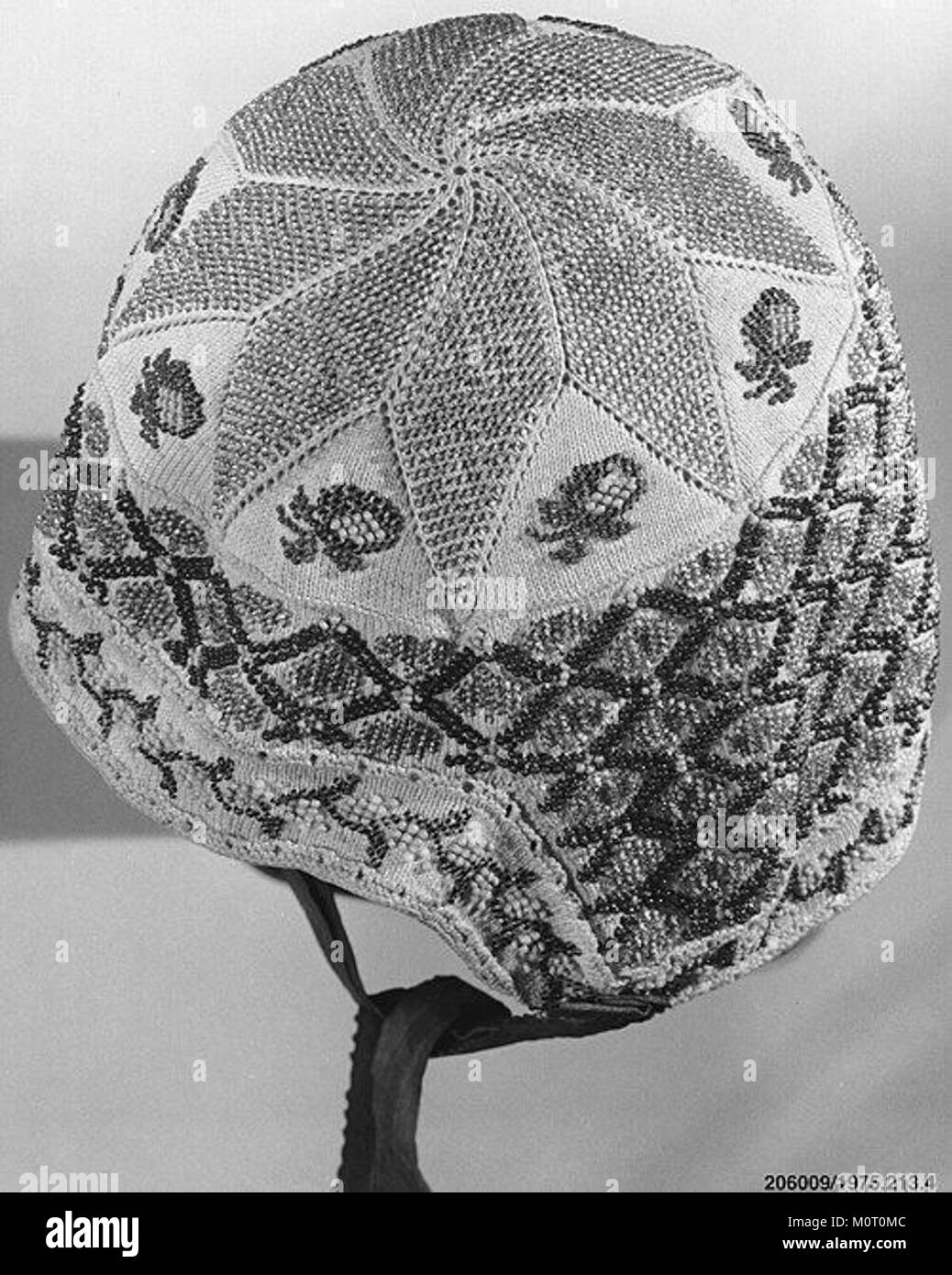 The 'Cap MET 206009' is likely a reference to a specific artifact or ...