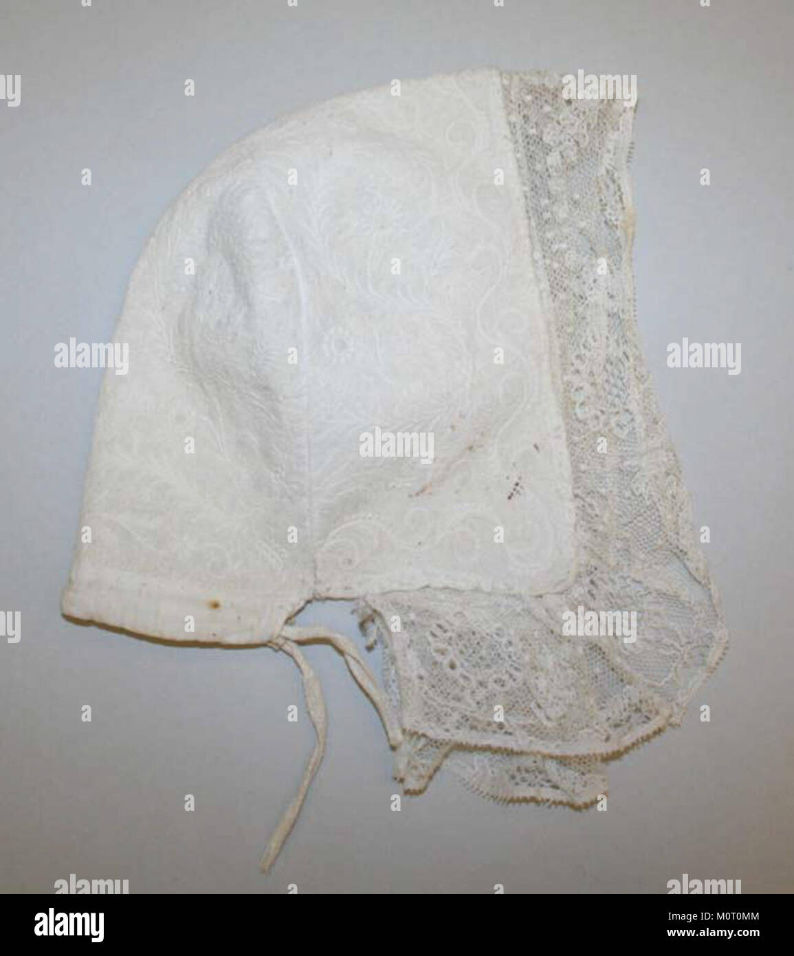 This is a historical cap from the MET collection, a significant piece ...