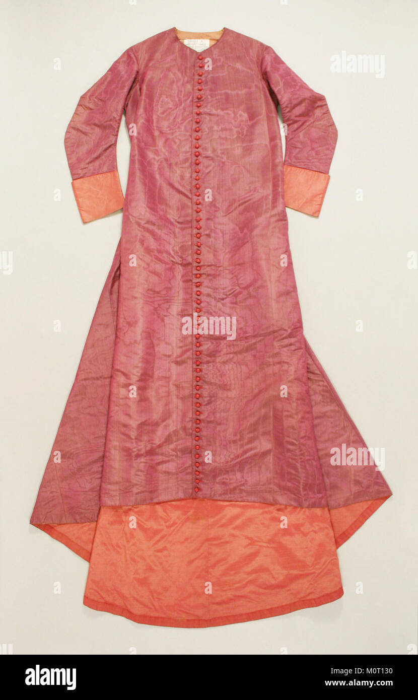 The cassock, a traditional garment worn by clergy, is represented in ...