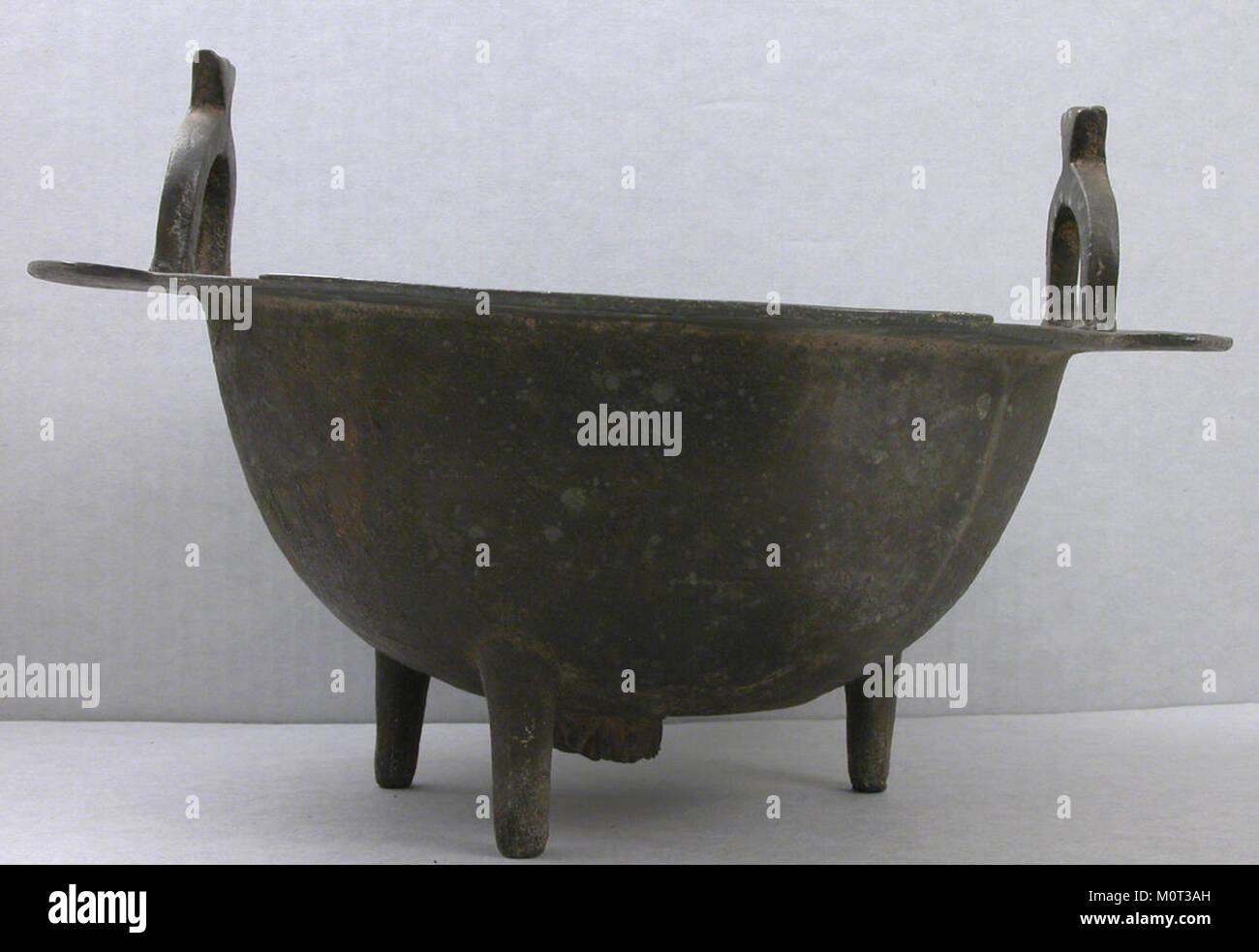 The cauldron, part of the MET collection, is an ancient metal vessel ...