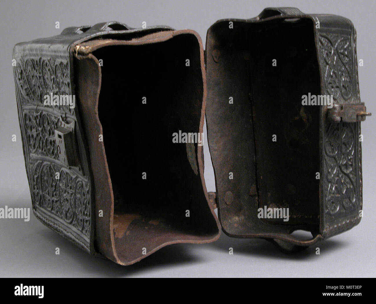 This object is a case designed for holding a book, part of The ...