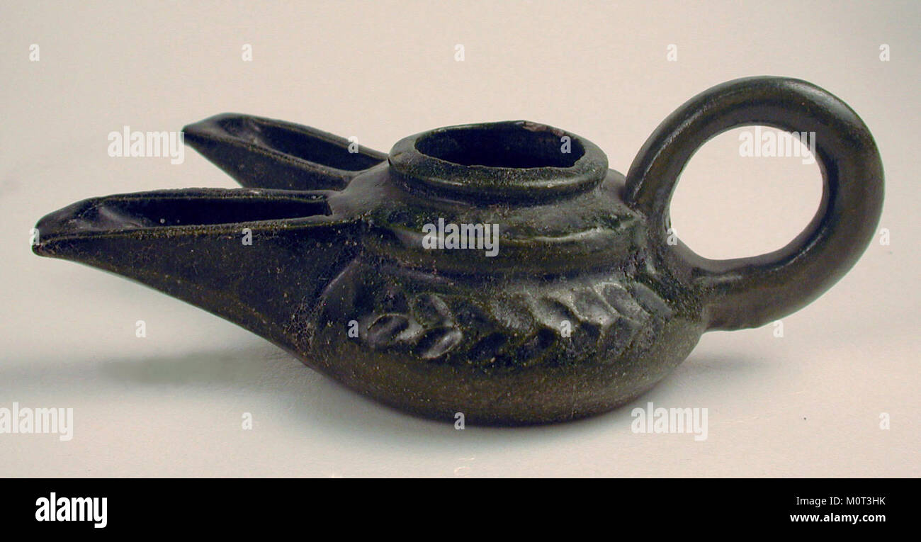This ceramic oil lamp, part of the Metropolitan Museum of Art ...
