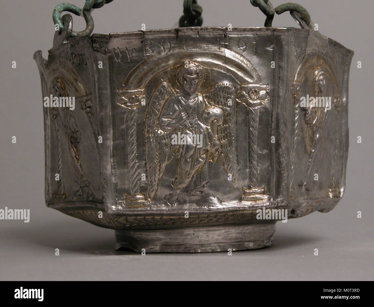 This censer, featuring six holy figures, is an example of religious art ...