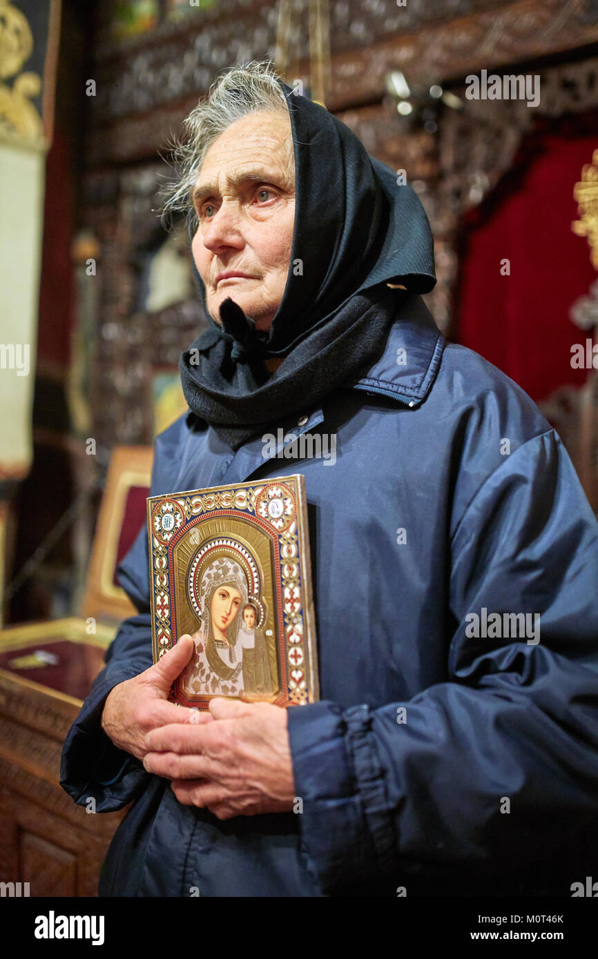 Mature woman old church hi-res stock photography and images - Alamy
