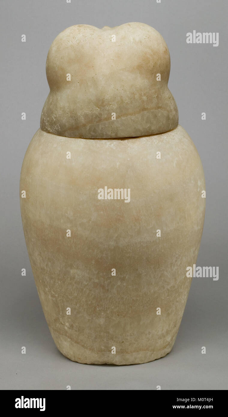A canopic jar with a baboon-headed lid, representing Hapy, the Egyptian ...