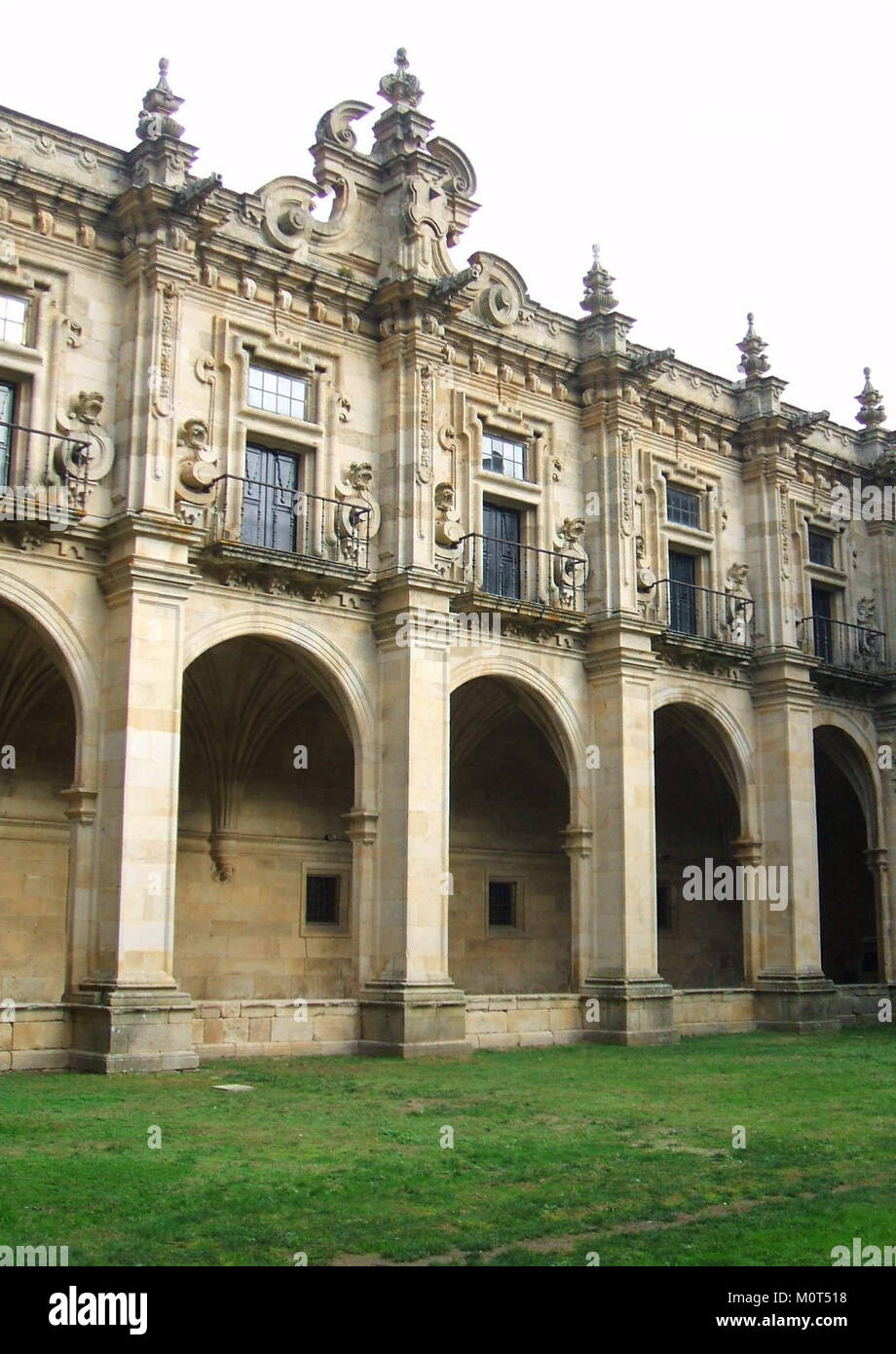 The photograph features the old cloister of the Monastery of San ...