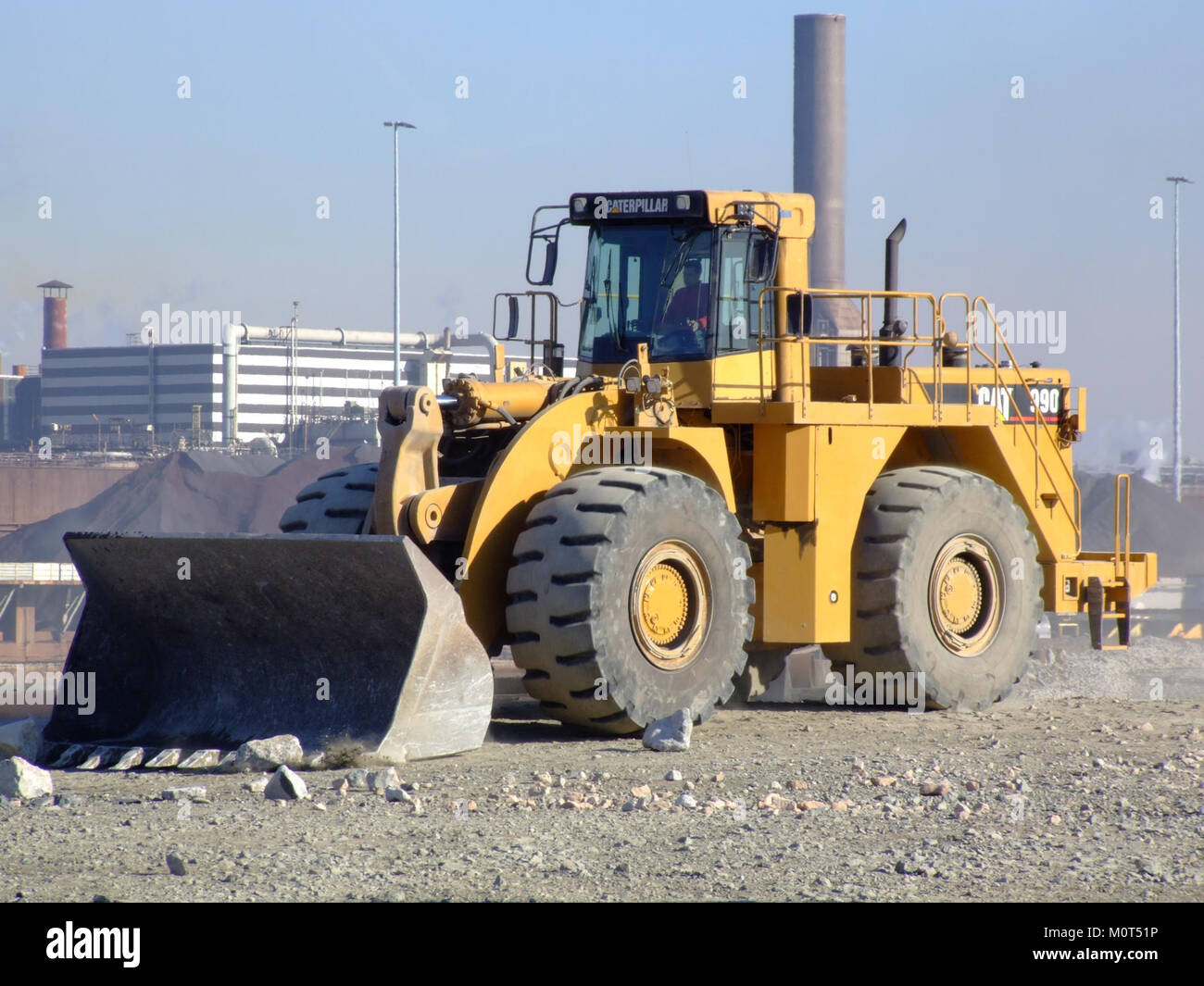 This image shows the CAT 990, a large and powerful machine in operation ...