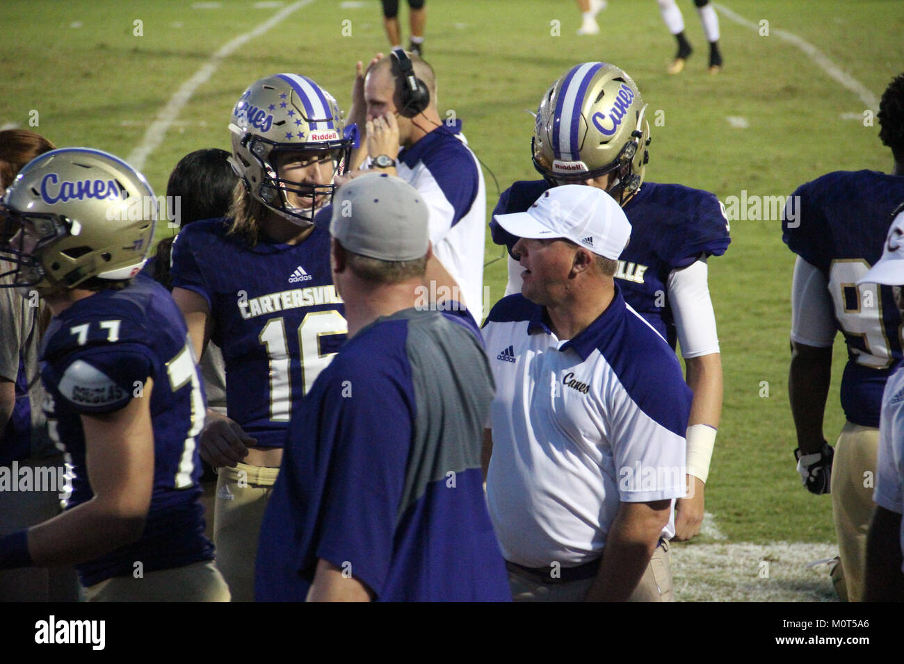 A high school football game between Cartersville High School and ...