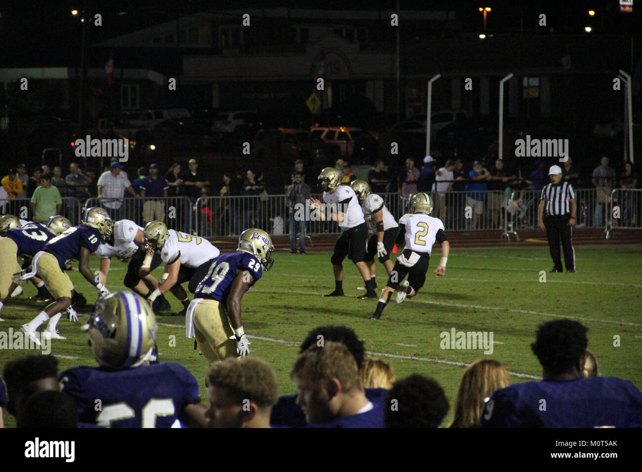 The photograph captures a moment from the 2017 high school football ...