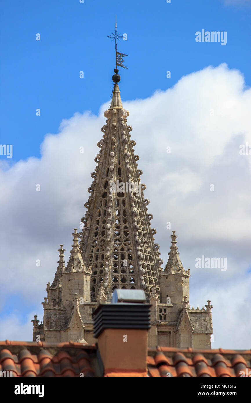 This image captures the pinnacle of a cathedral, showcasing the ...