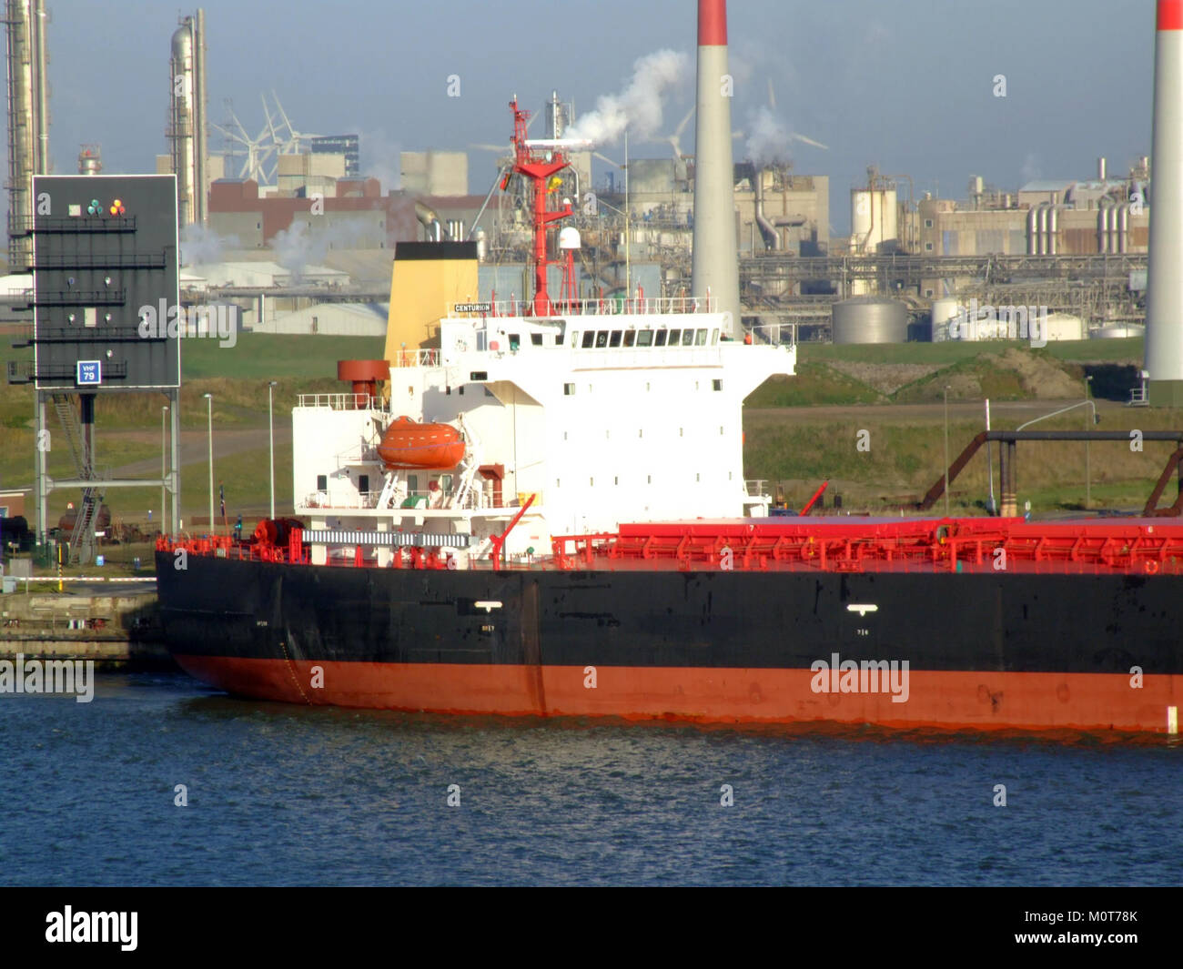 The Centurion, a vessel with IMO number 9304174, is shown passing under ...