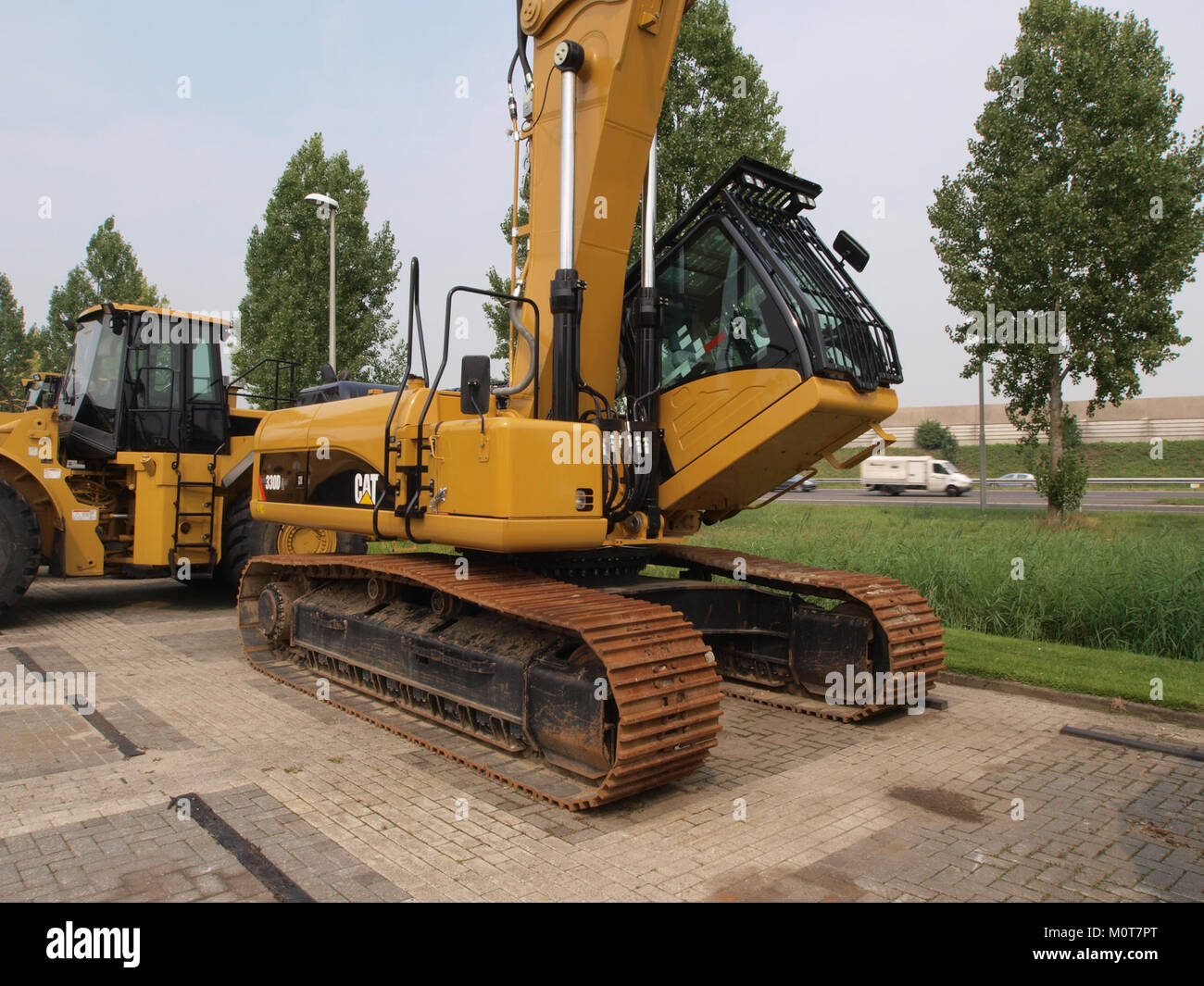 The Caterpillar 330DL is a model of hydraulic excavator, designed for ...