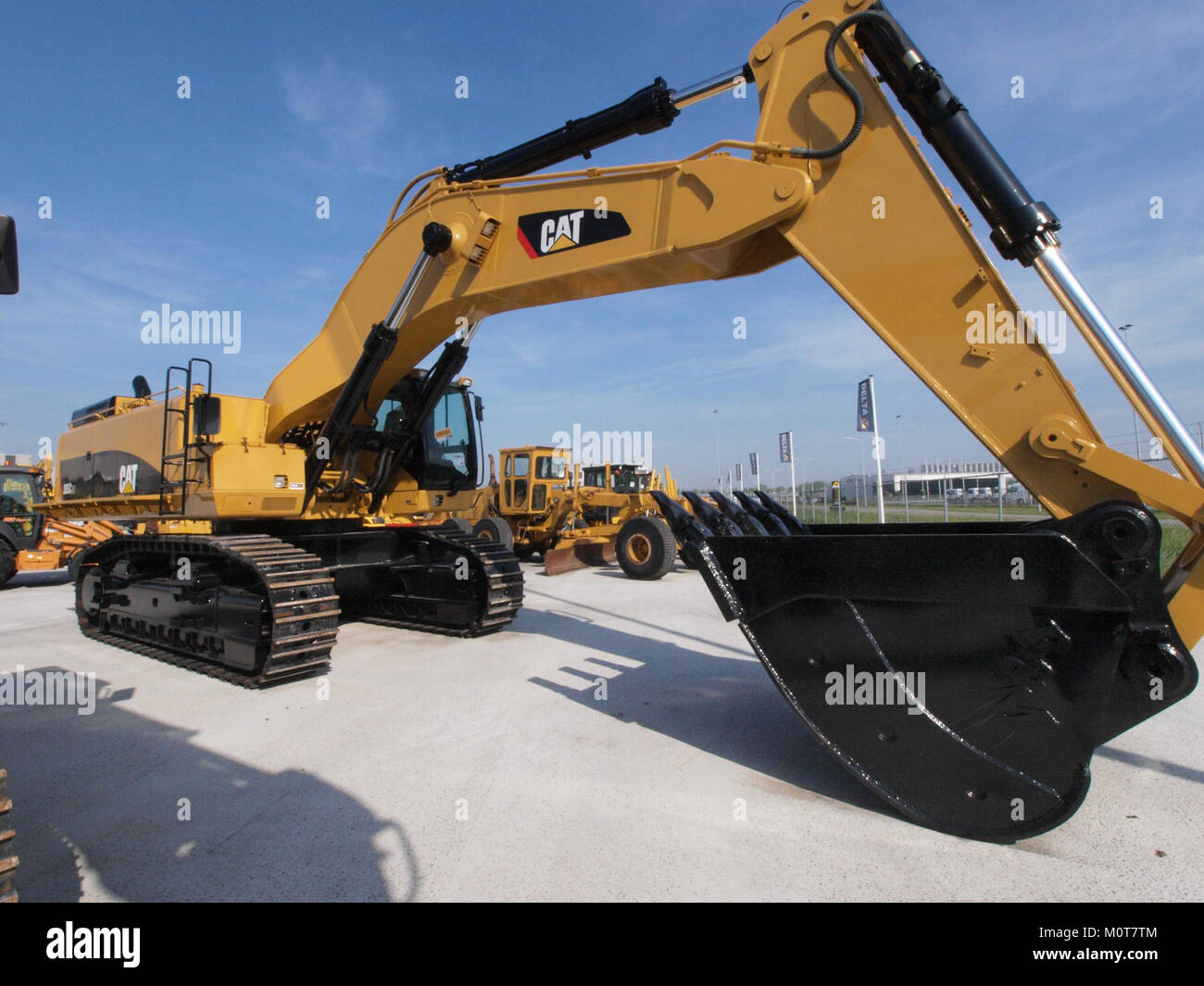 The Caterpillar 385CME is a large hydraulic mining excavator used in ...