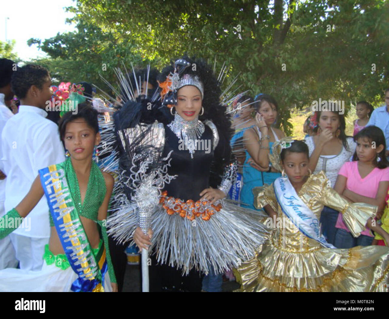 This photograph captures the vibrant colors and energy of a carnival ...