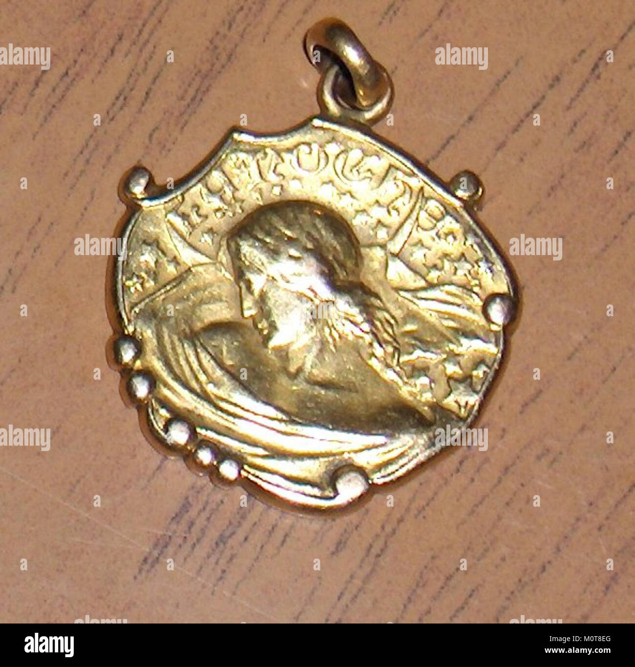 Cara oro is a term referring to a traditional gold coin or object ...
