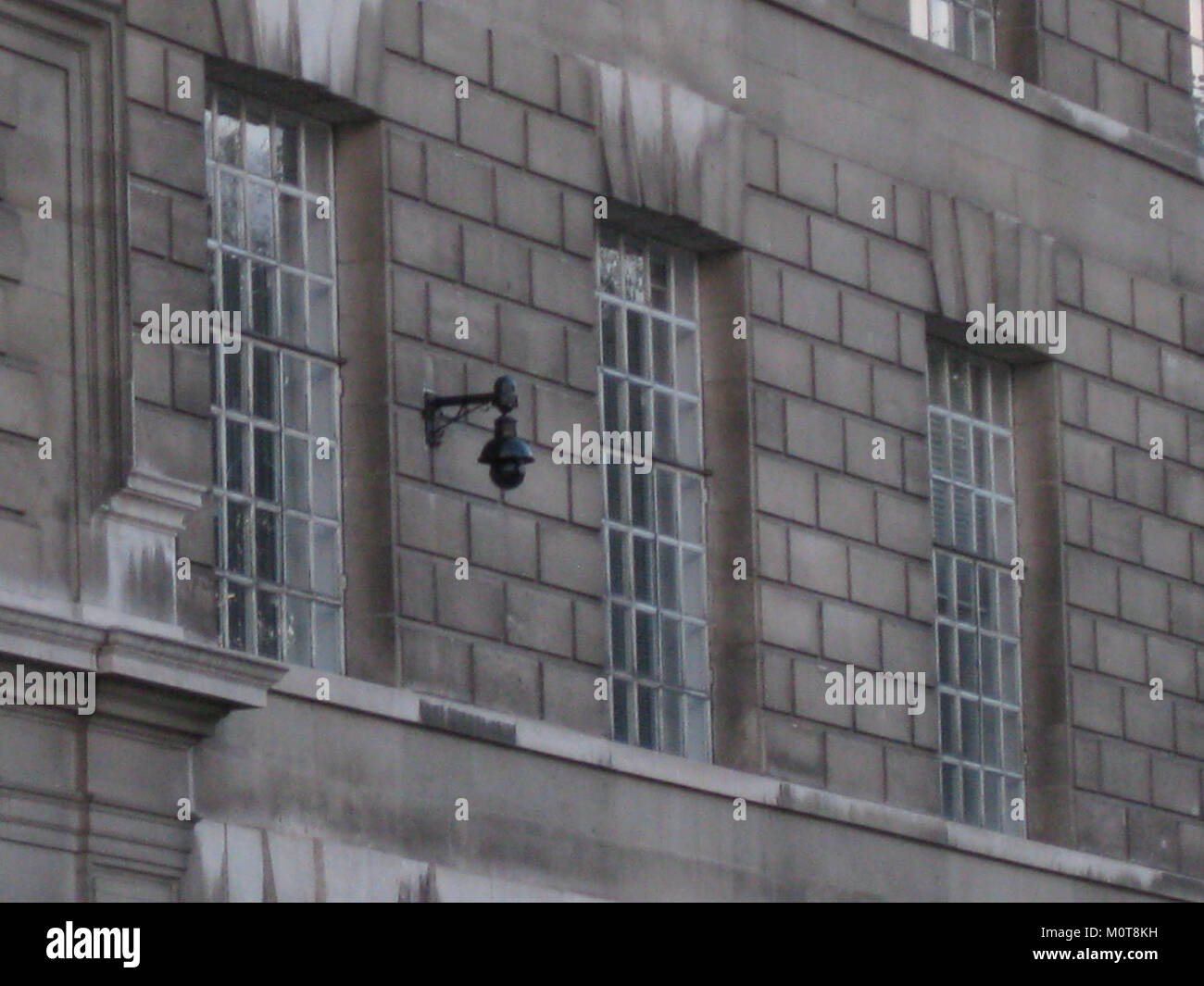 A photograph showing the installation of CCTV cameras in London ...