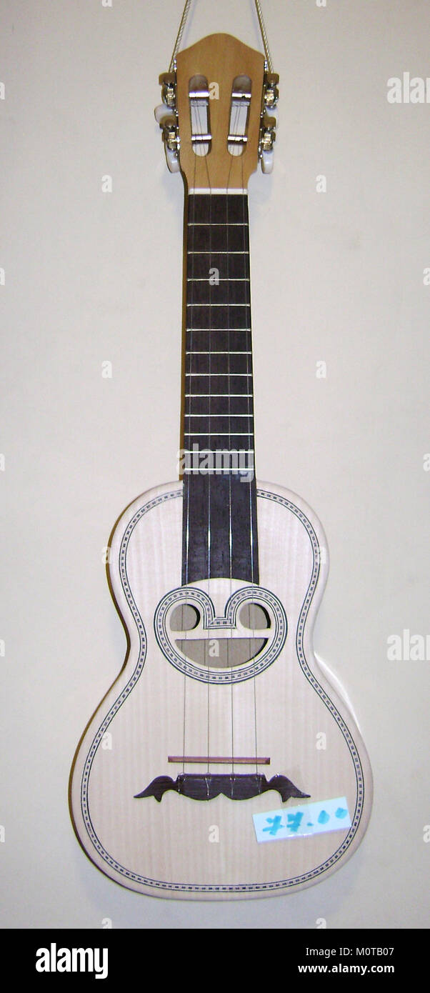 The cavaquinho minhoto is a traditional Portuguese string instrument ...