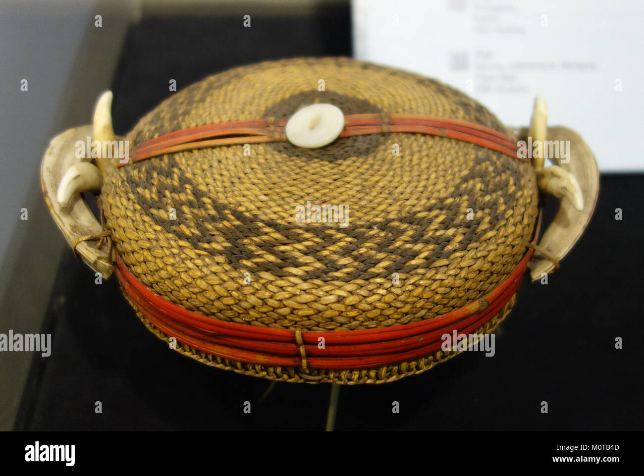 This 20th-century cap from the Philippines is made from plant fibers ...