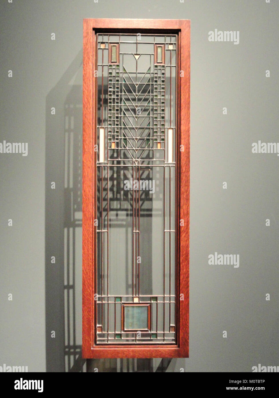 This casement window, designed by Frank Lloyd Wright in 1904, features ...