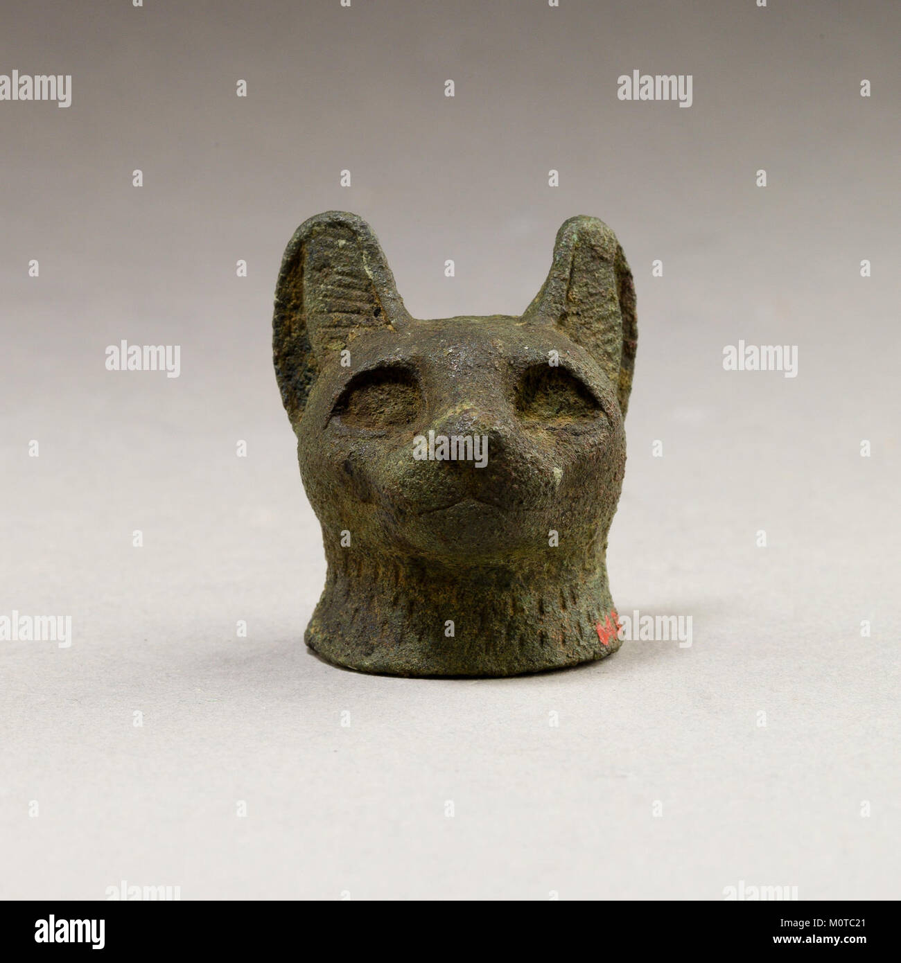 The Cat Head artifact, cataloged as MET 04.2.596 EGDP014392, is a piece ...