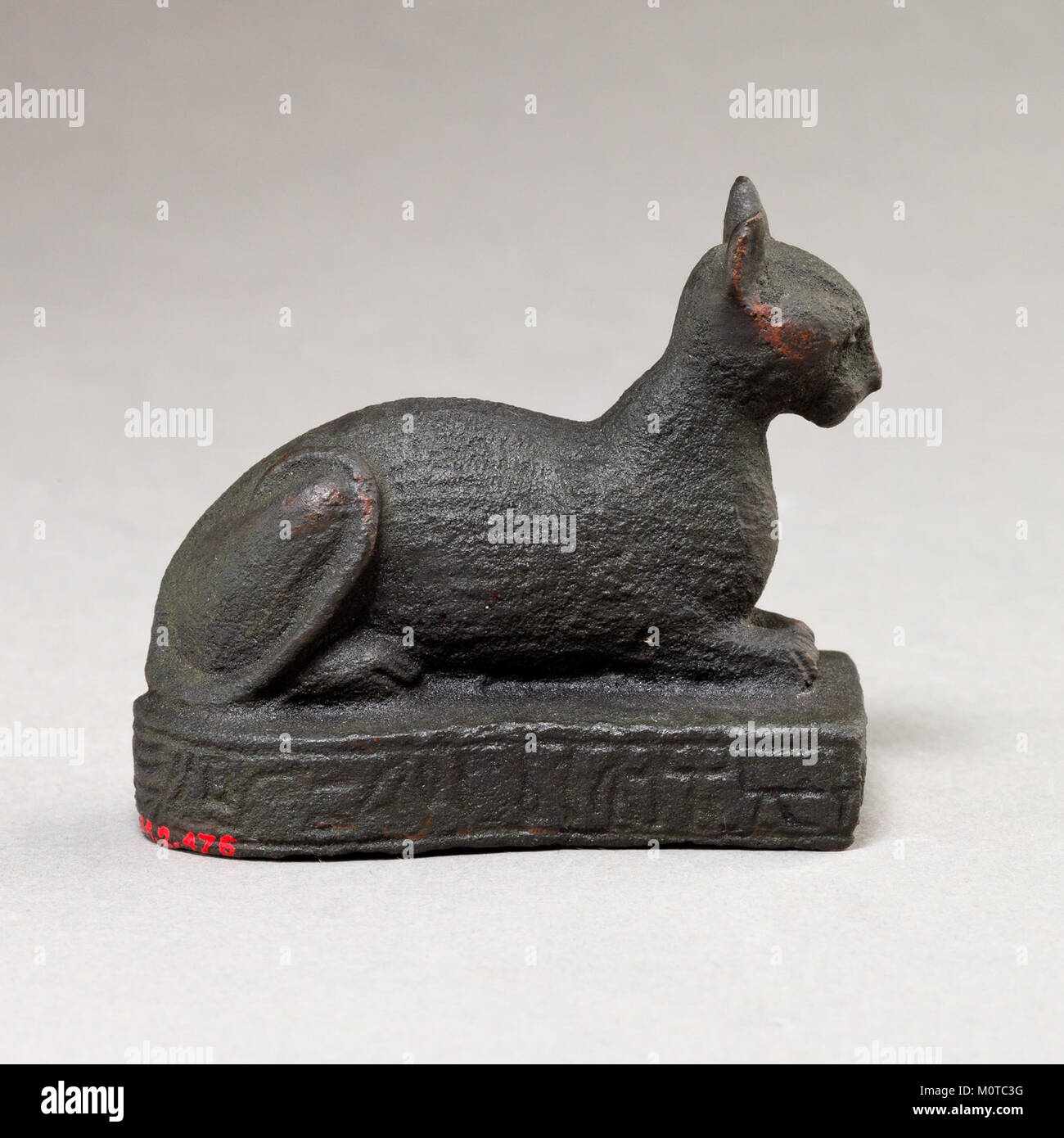 A stone cat sculpture, inscribed with dedication for the ancient ...