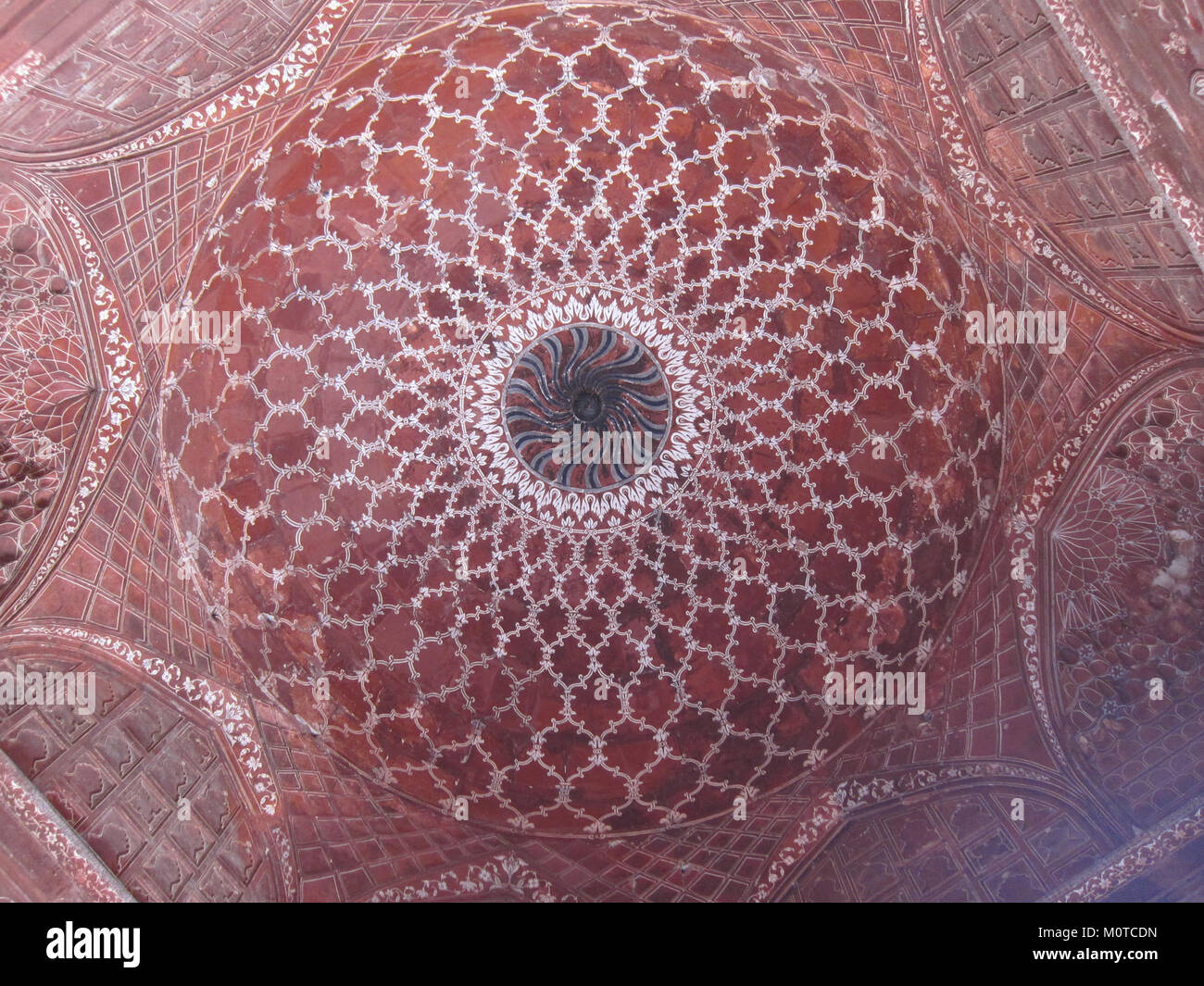 The ceiling of the Taj Mahal mosque in India is an exquisite example of ...
