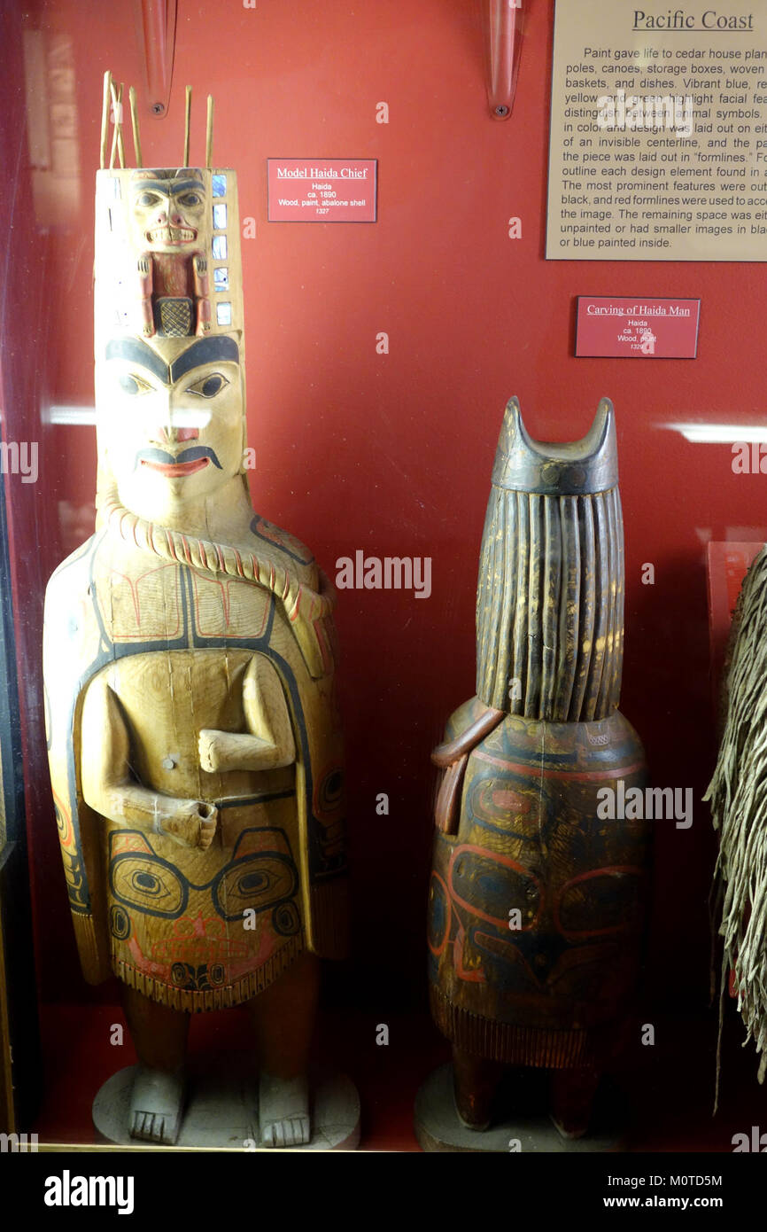 A Haida carving depicting a chief and a man, created around 1890 using ...