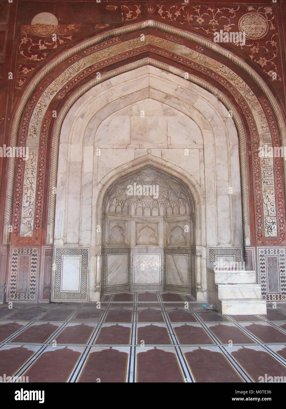 The center mihrab in the Taj Mahal mosque is a significant ...
