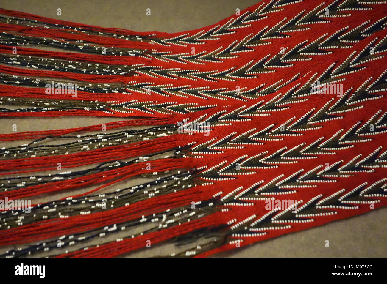 This Huron-Wendat finger-woven sash, made from wool and glass beads ...