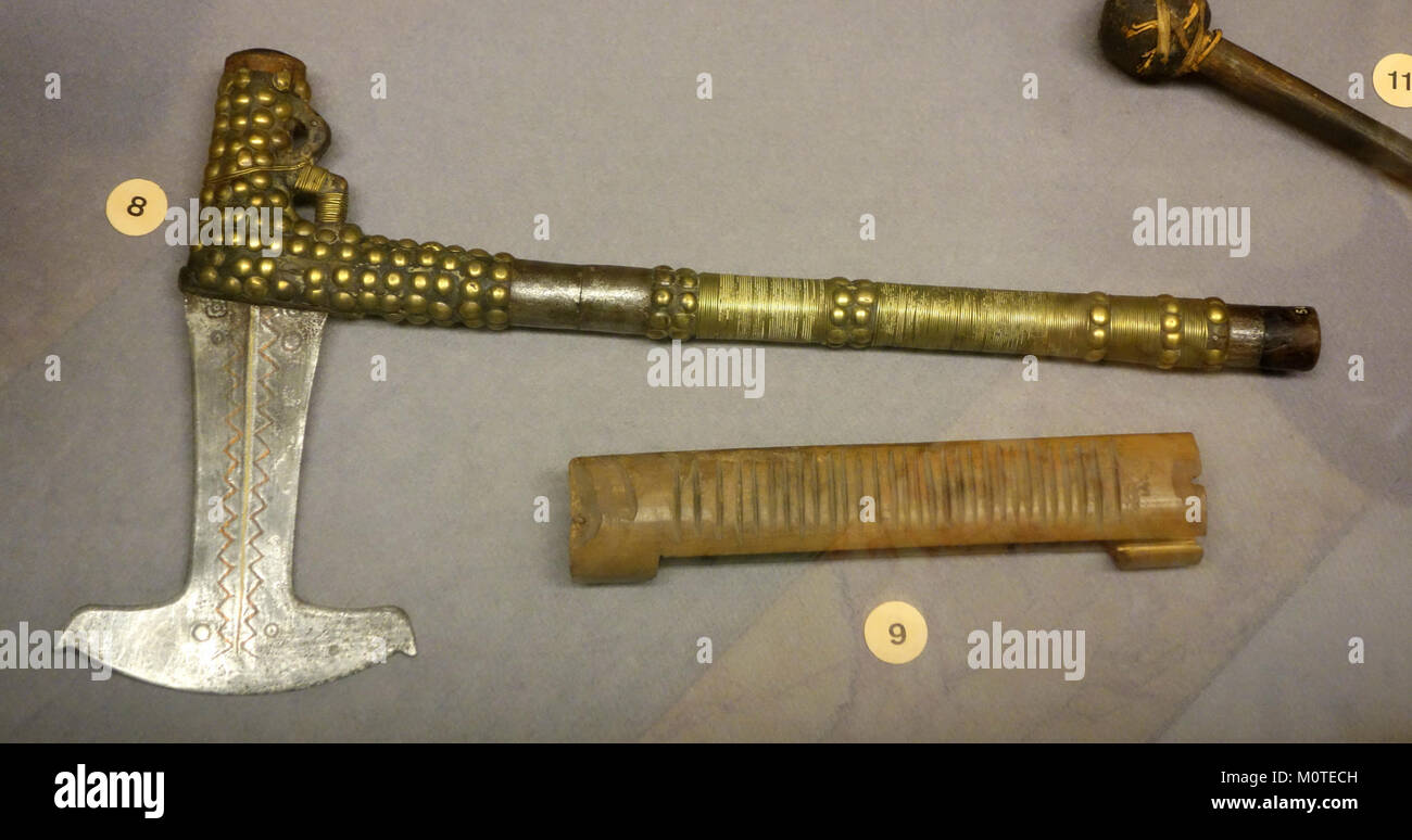 Photograph of a ceremonial Chokwe hatchet (tshimbuya) and a Lunda ...