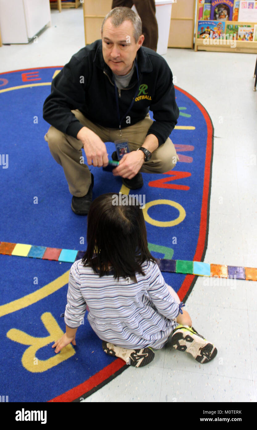 Providing insight into the early years of the school hi-res stock ...