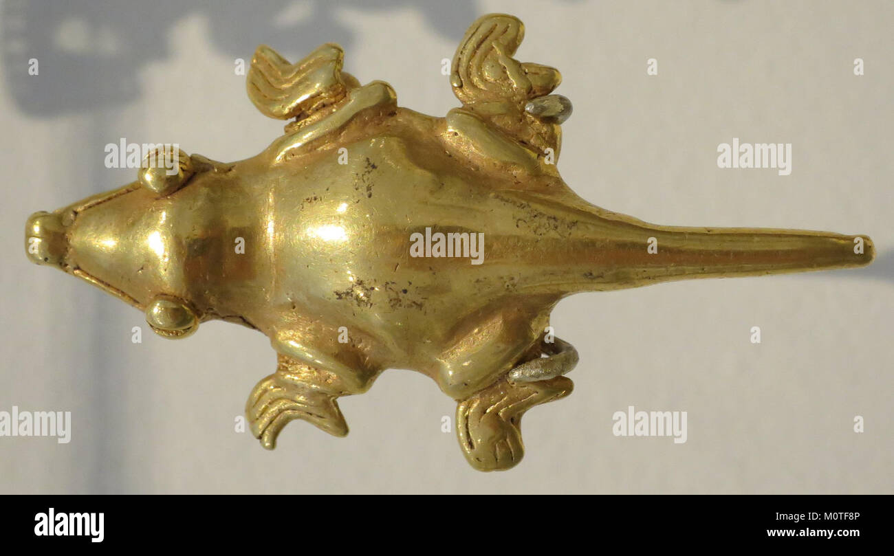 This cast gold crocodile pendant, from Panama and housed in the ...
