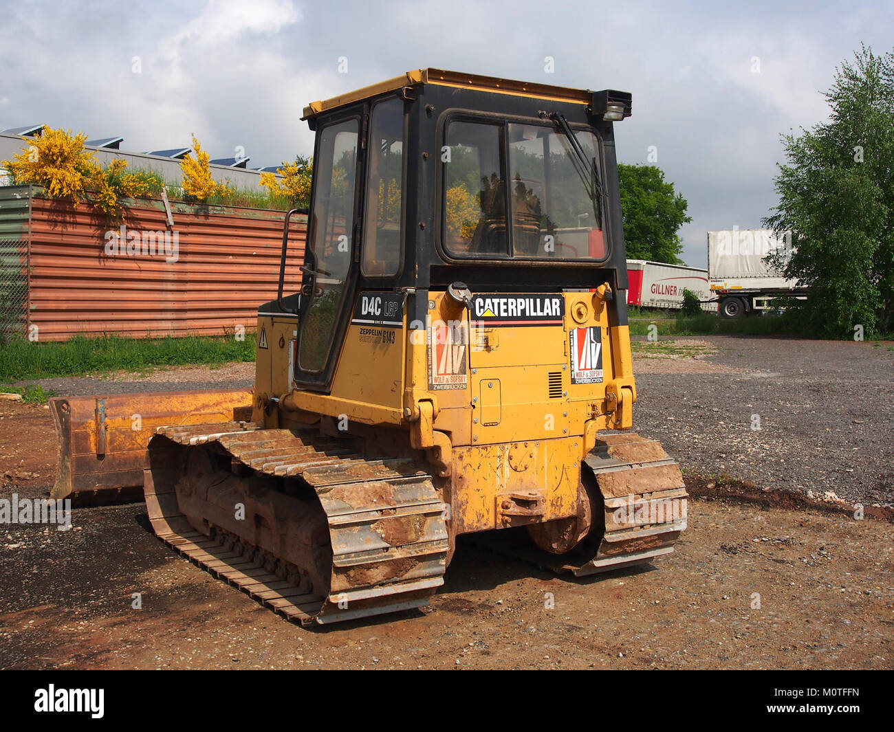 This image showcases the Caterpillar D4C LGP, a type of bulldozer, at ...
