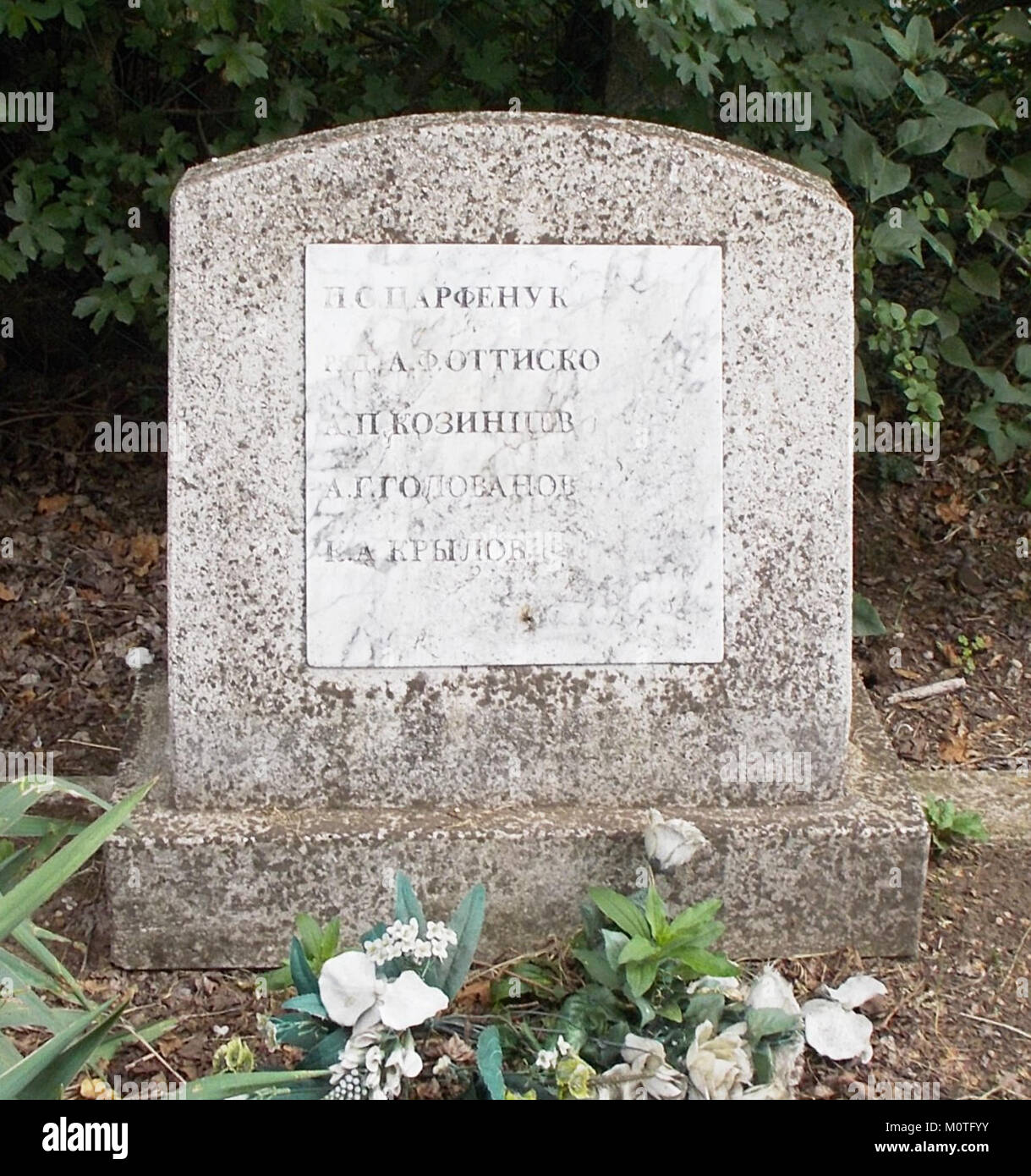 This image depicts a cemetery in Vecses, Hungary, a site of cultural ...