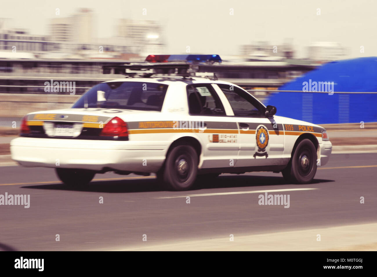 This image depicts a car in motion, showcasing the dynamic movement of ...