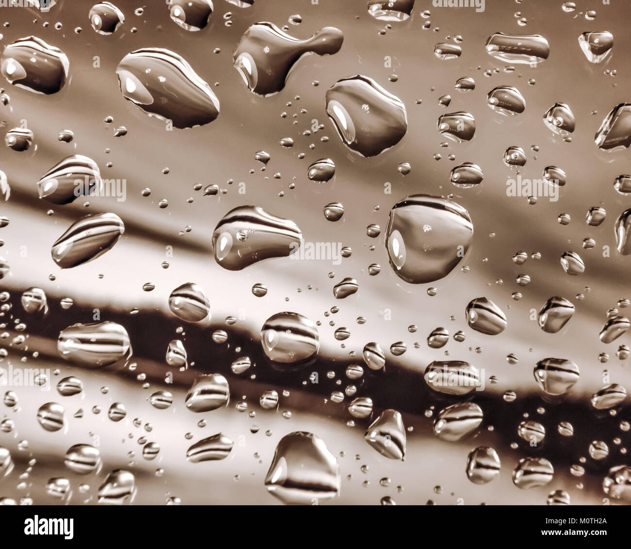Perfect Rain Drops on Colorful Glass Stock Photo - Alamy