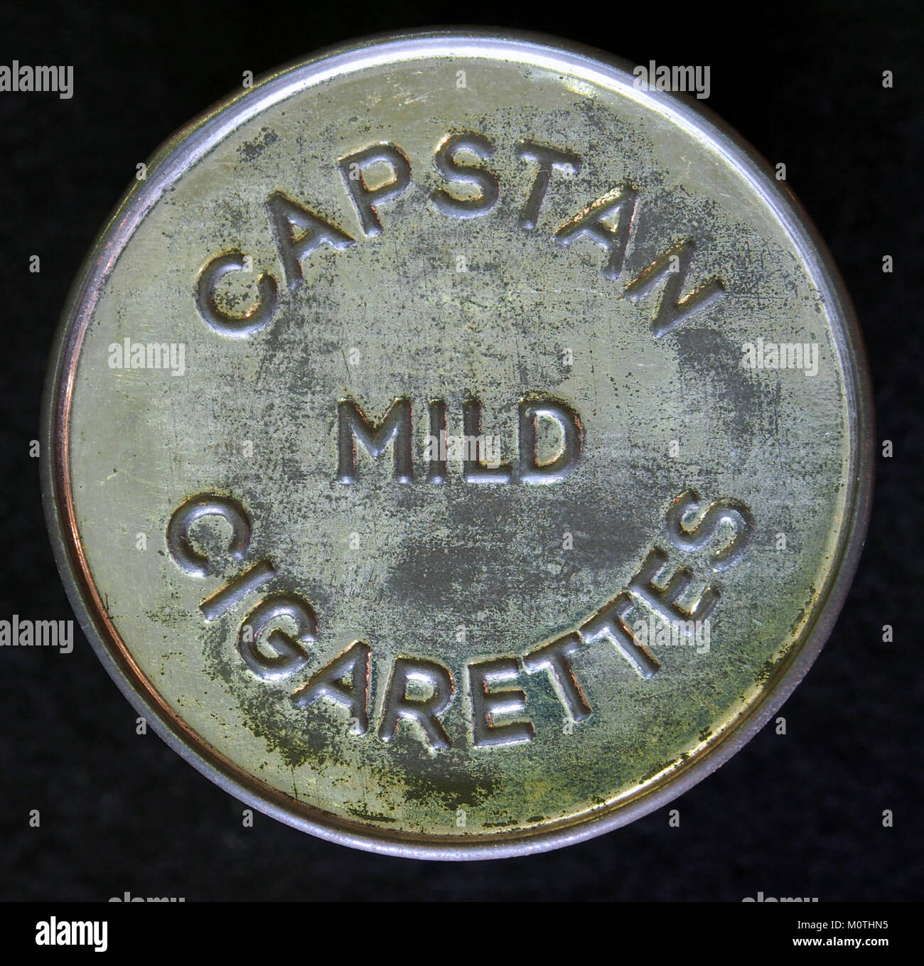 An image of a vintage tin of Capstan Navy Cut cigarettes, reflecting ...