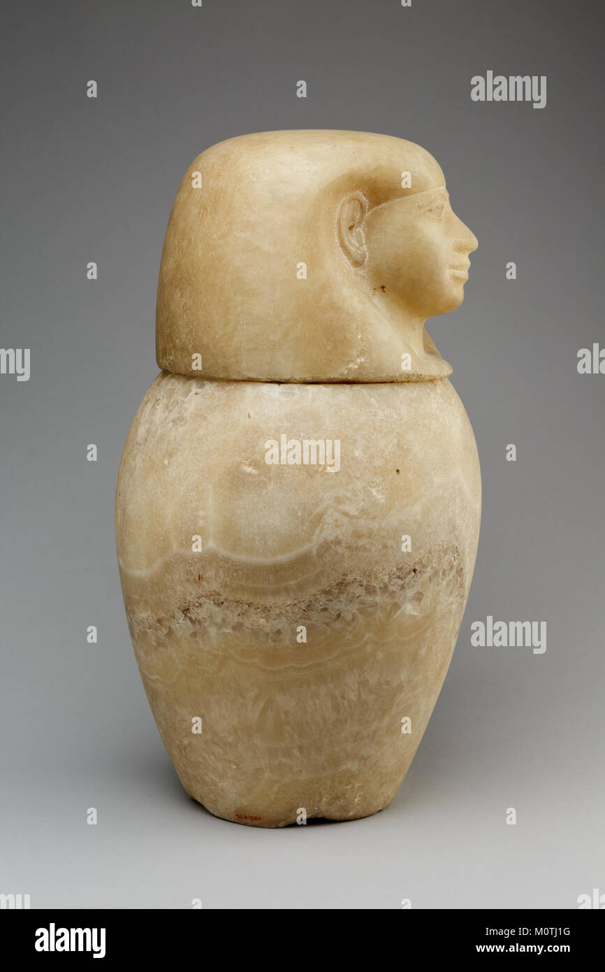 This ancient Egyptian canopic jar with a human-headed lid was used in ...
