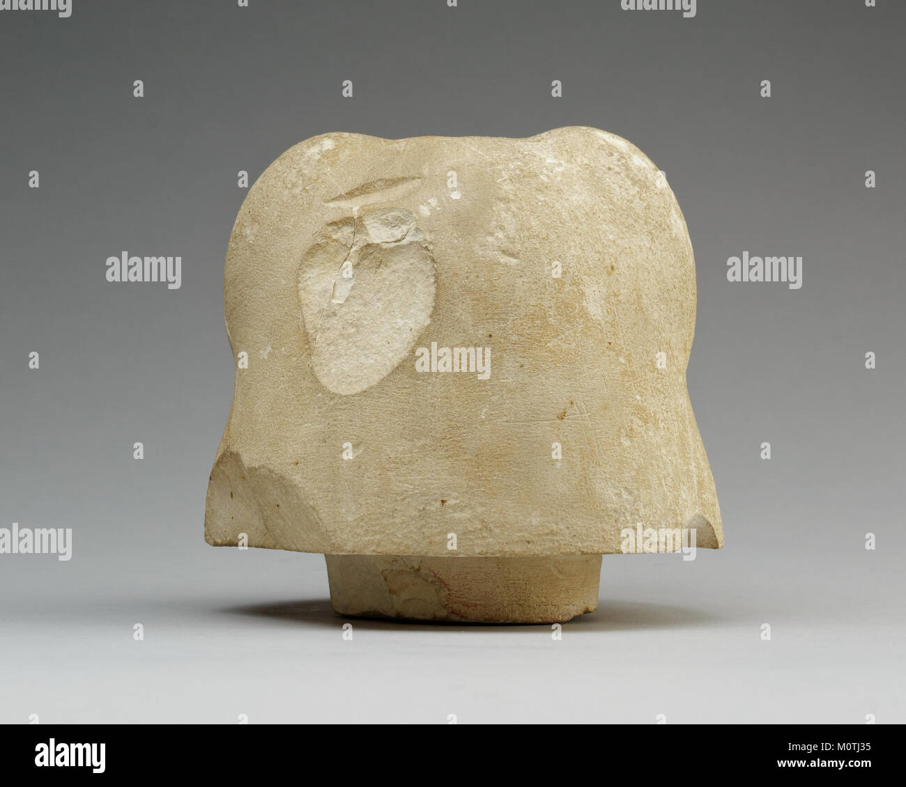 This canopic jar lid, dating to ancient Egypt, depicts the head of Hapy ...