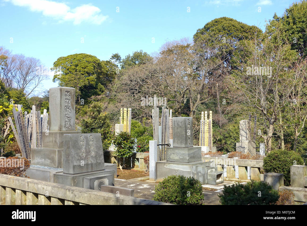 This photograph shows the cemetery at Gokokuji Temple, located in the ...
