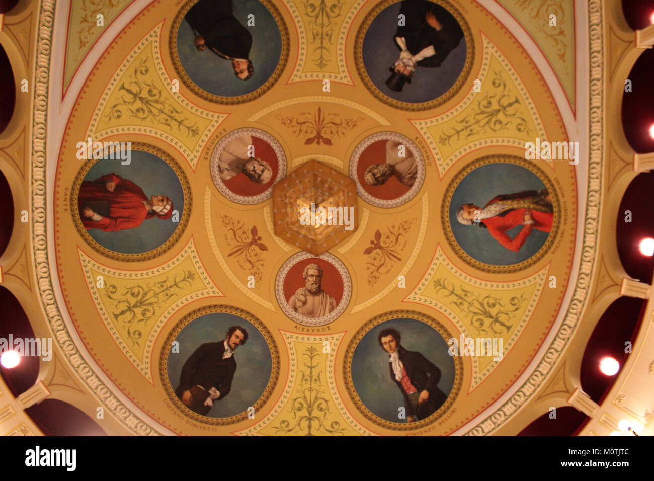 The ceiling of the Apollon Theater showcases intricate architectural ...